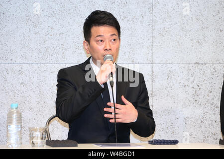 Japanese comedians Hiroyuki Miyasako and Ryo Tamura (unseen) attend a ...