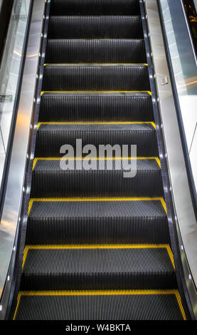 indoor underground parking escalator Stock Photo - Alamy