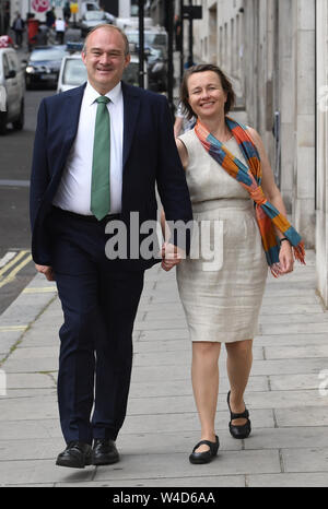 Ed Davey (left) and his wife Emily Gasson, arrive at Proud Embankment ...