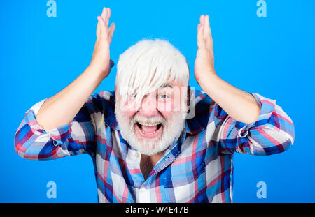 Senior man with long bangs and beard. Subculture and lifestyle ...