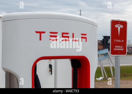 Tesla Vehicle Charging sign at Tesla Supercharger Station, CF Limeridge ...