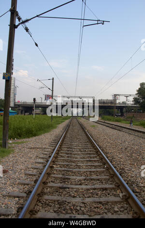 Railway tracks crossing under the overpass, Delhi, India Stock Photo ...