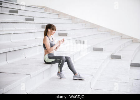 People sitting on bleachers in preparation for the festivities of the ...