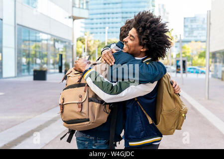 Happy Afro man and colleagues in laser tag room Stock Photo - Alamy