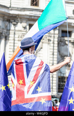 London, England, United Kingdom - 23/07/2019: People waiting outside ...