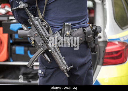 a police heckler and koch mp5 assault rifle and a special forces mp5 ...