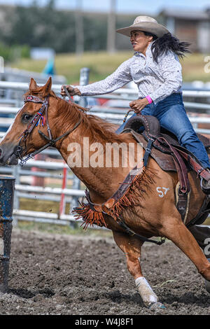 Barrel Racer at the Kainai Rodeo in Stand Off , Alberta Canada Stock ...