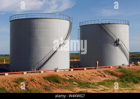 Secure oil storage tanks Stock Photo - Alamy