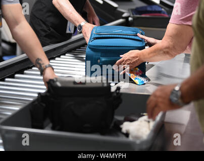 Control of passengers and baggage screening at airports Stock Photo - Alamy