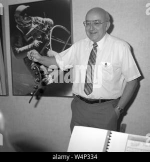 NASA Ames Research Center director Eugene Tu, left, speaks alongside UC ...