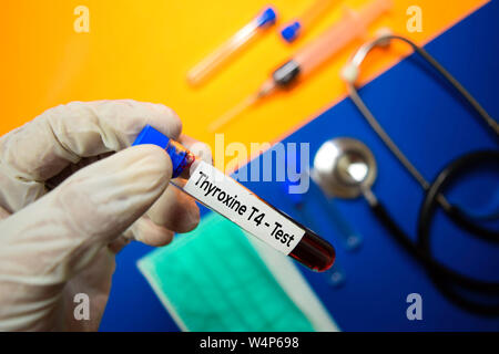 Thyroid-stimulating hormone (TSH). Test tube with artificial hormone on ...