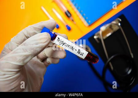 Triglyceride - Test with blood sample. Top view isolated on office desk ...