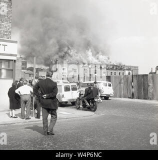 Smoke from a warehouse fire in the Solomianskyi district spreads over ...