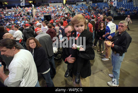 Baby Trump Hunter Tirpak is held by mother Jessica Tirpak during a ...