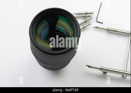 Repair digital lens service theme. Fixing electronic work Stock Photo ...
