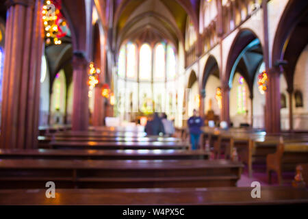 Defocused church interior blur abstract background with Christmas trees ...