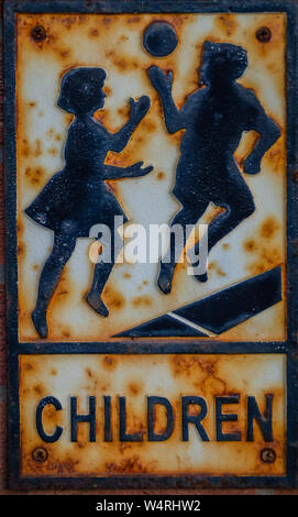 Playground for children warning sign Stock Photo - Alamy