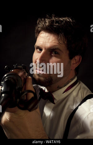 Black and white portrait of a gangster pointing a gun Stock Photo - Alamy