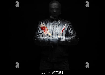 Serial killer hand with bloody killer tools and black gloves Stock ...