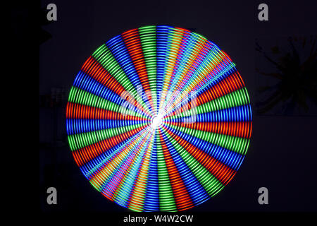 Light painting / light drawing spining colorful circle Stock Photo - Alamy