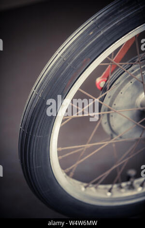 Color image of a vintage thin motorcycle wheel Stock Photo - Alamy