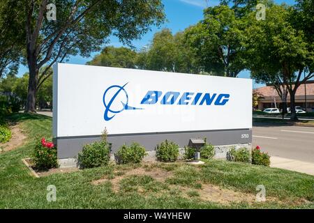 Facade with sign and logo at office of aerospace company Boeing in ...