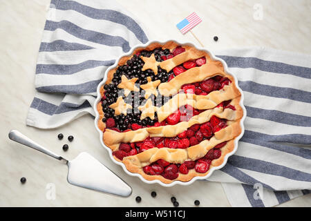 Tasty American flag pie on table Stock Photo - Alamy