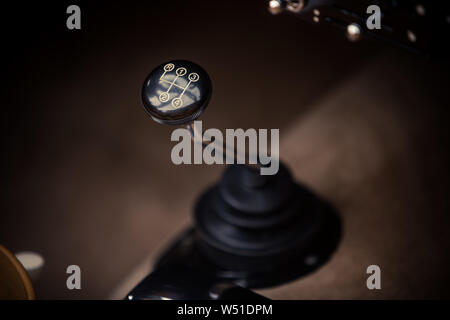 A vertical closeup shot of a black shift knob Stock Photo - Alamy