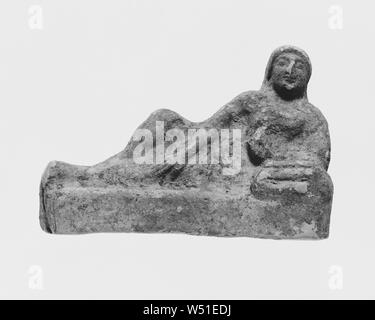 Figure of a Reclining Banqueter. Unknown Stock Photo - Alamy