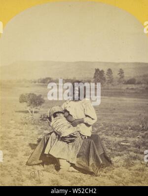 Apache squaw and child. 1873 Stock Photo - Alamy