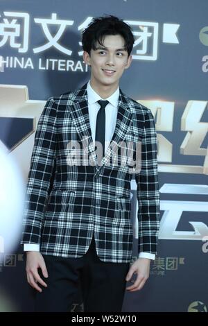 Chinese actor Leo Wu poses on the red carpet at the 20th Huabiao Film ...