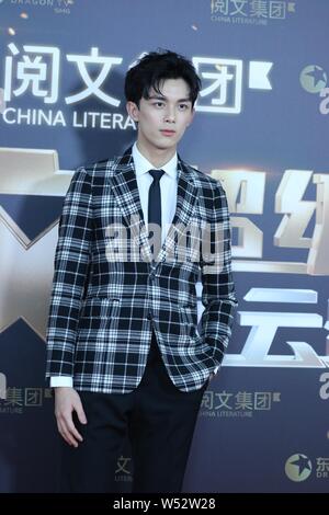 Chinese actor Leo Wu poses on the red carpet at the 20th Huabiao Film ...