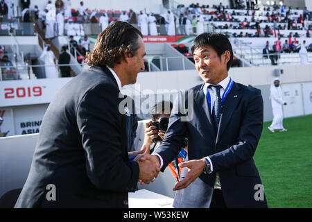 Japan head coach Hajime Moriyasu smiles during the World Cup Group F ...