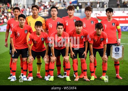 Qatar starting players pose for a team photo at the beginning of the ...