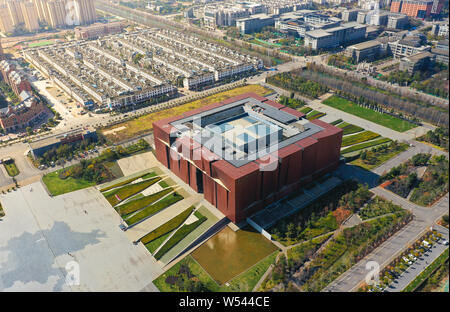 A view of the Yunnan Provincial Museum resembling a stamper from above ...