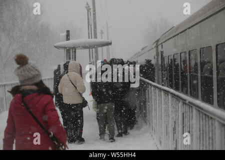 Chinese tourists take a S2 Maglev subway train to visit the Badaling ...