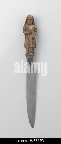 Knife with a handle in the shape of a nun, The nun holds a flaming ...