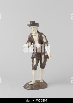 Begging figure with stick. Beggar with stick Stock Photo - Alamy