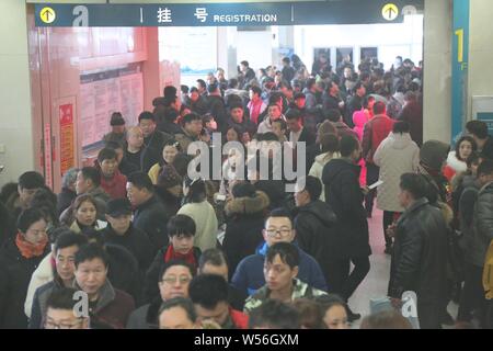 Patients crowd the First Affiliated Hospital of Zhengzhou University in ...