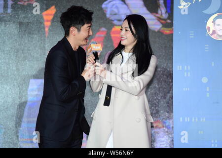 Chinese actress Yao Chen, right, and Hong Kong actor Gordon Lam pose at ...