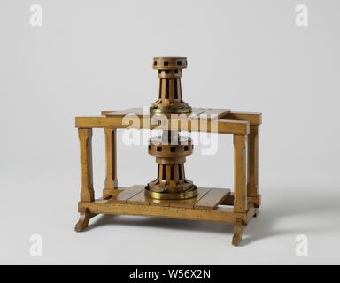 Model or a capstan. Model of a capstan in a wooden frame of two levels ...