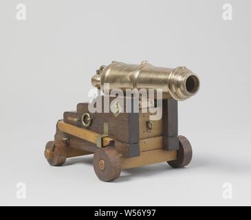 Model or a 12-pounder Carronade on deck. Model of a 12 pound carronade ...
