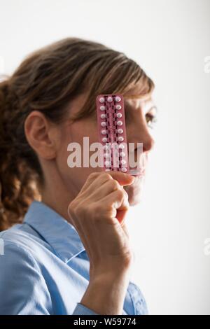 Hormone replacement therapy (HRT) pills. Premarin controversially ...