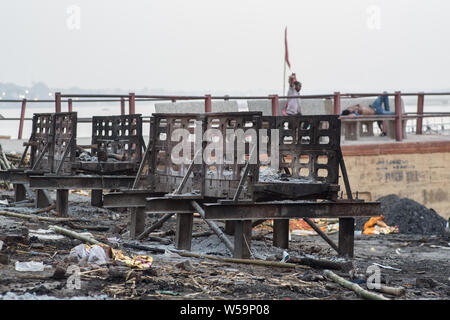 Cremation of a body, in Manikarnika Ghat, the burning ghat, on the ...