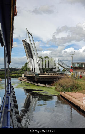 Exeter Canal Cruise passes Countess Weir with a bascule bridge and ...