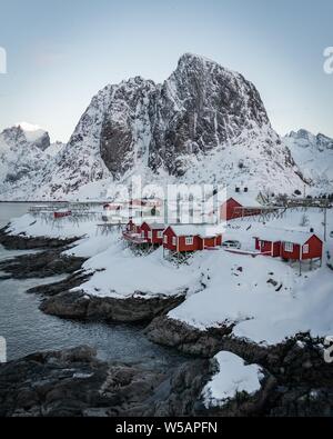 A drone shot of houses on the coast of a lake in Zahara de la Sierra ...