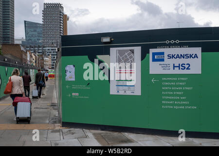 July 2019, HS2 construction signage around Euston Station in London, on ...