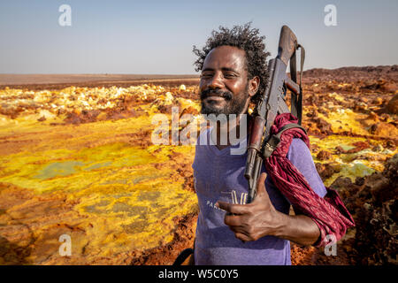 An armed guide for people traveling through the Dallol hydrothermal hot ...