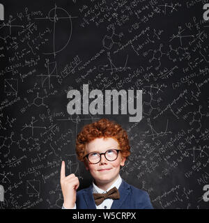 Smiling genius child in glasses portrait Stock Photo - Alamy