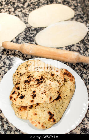 Homemade indian naan bread, close up view Stock Photo - Alamy
